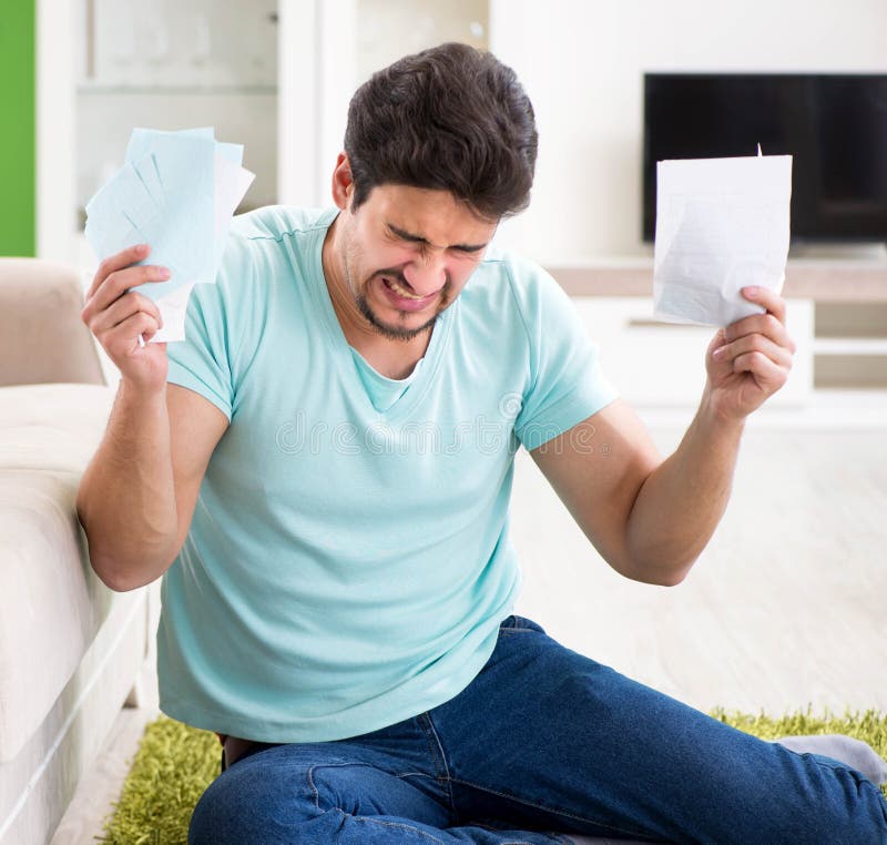 Young Man Struggling with Personal Finance and Bills Stock Photo ...