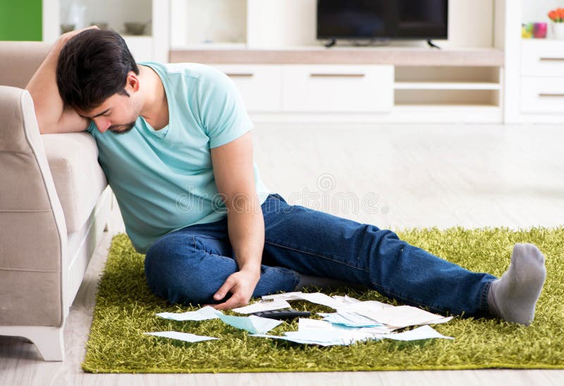Young Man Struggling with Personal Finance and Bills Stock Photo ...