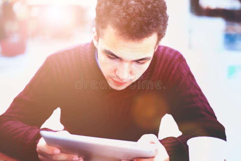 Young Man Student Using Tablet Computer in Cafe Stock Photo - Image of candid, portrait: 91232618