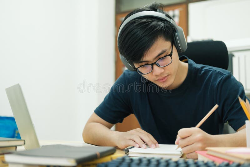 Young Man Study in Front of the Laptop Computer at Home Stock Photo ...