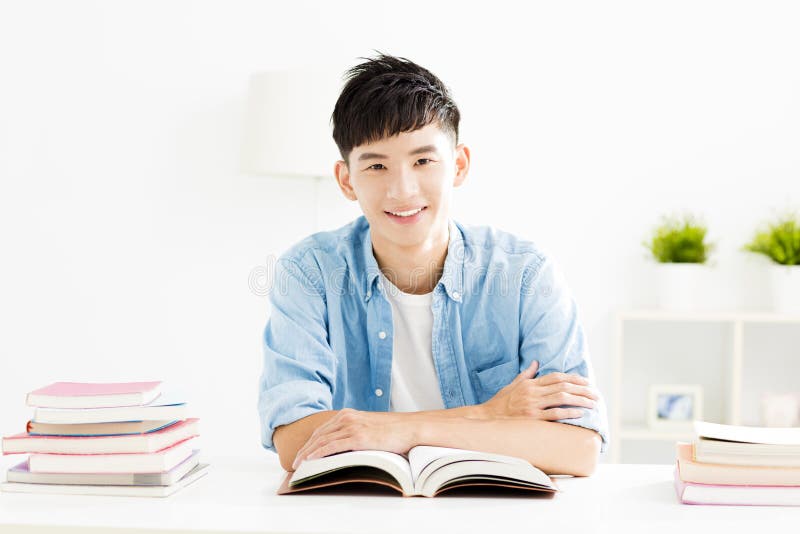 Young Man Studying in Living Room Stock Image - Image of interior, home ...