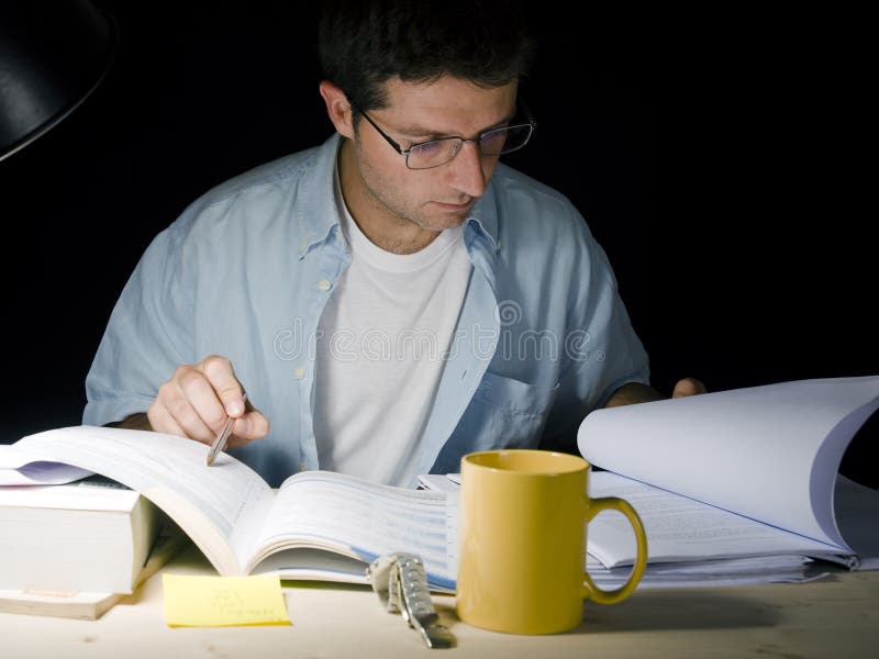Young Man Studying At Night Stock Image - Image of learning, male: 33082041