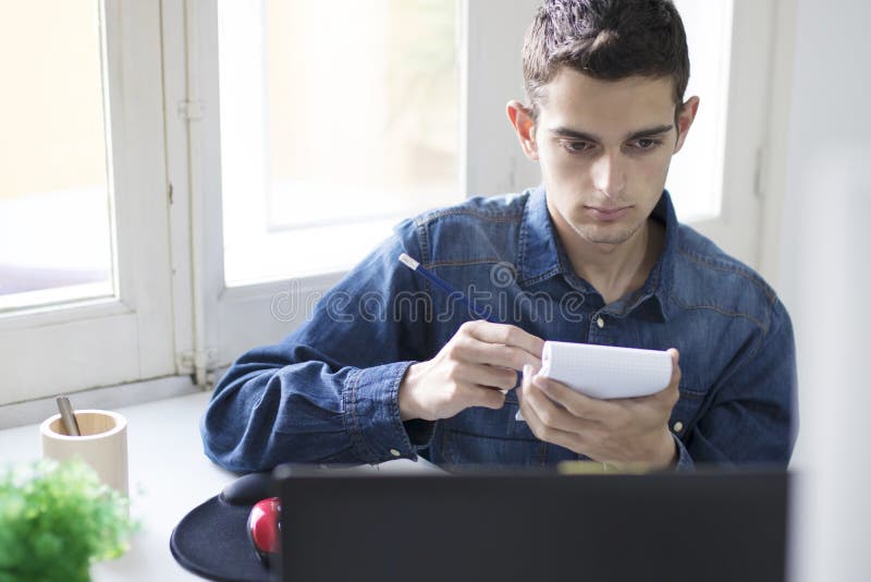 Young Man Studying and Working with the Computer Stock Photo - Image of ...
