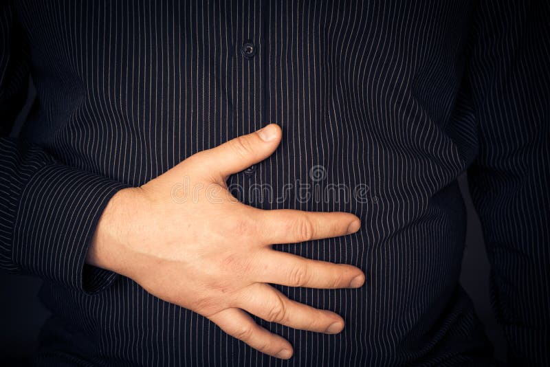 Young Man Suffering Abdominal Pain Stock Image - Image of satiated ...