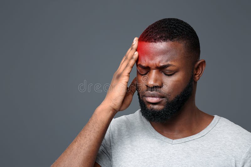 Young Man Suffering from Headache, Touching Forehead Stock Photo ...