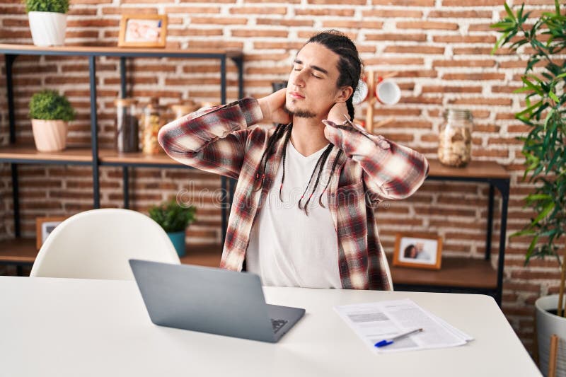 Young Man Suffering for Neck Pain Studying Sitting on Table at Home ...