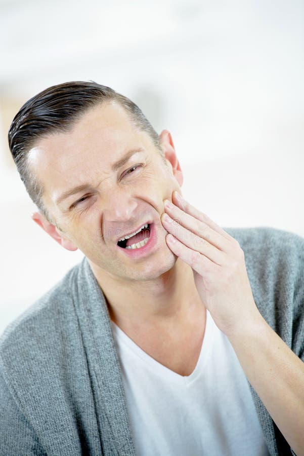 Young Man Suffering from Toothache Stock Image - Image of copy, living ...