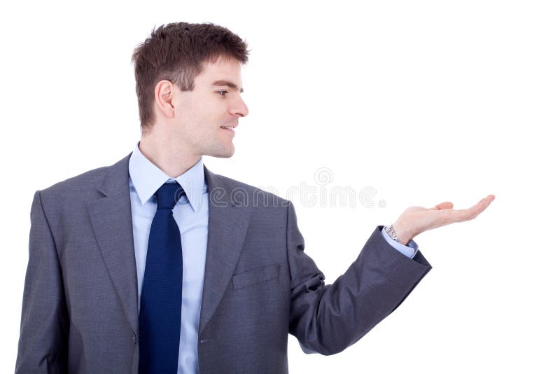 Young Man in a Suit Showing Something Stock Photo - Image of ...