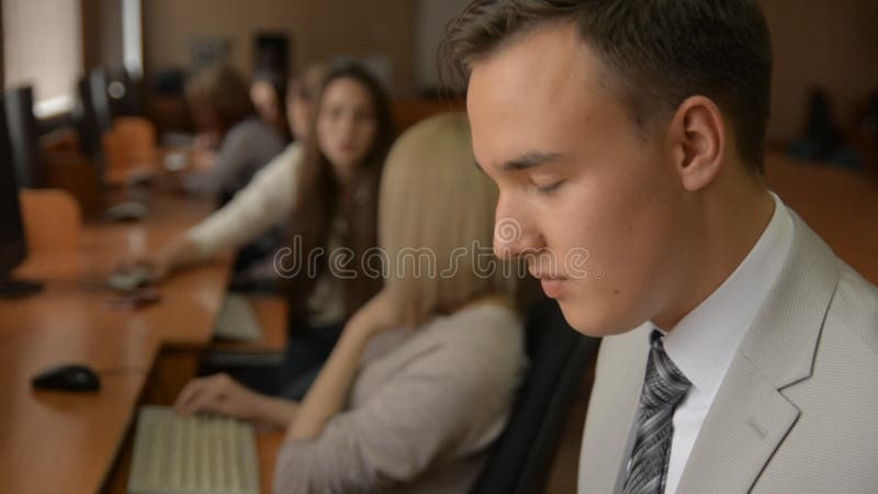 Young Man in Suit Working at Computer Stock Footage - Video of pupil ...