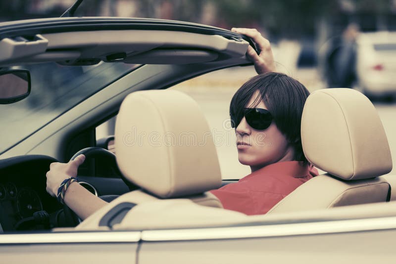 Young Man in Sunglasses Driving Convertible Car Stock Image - Image of ...
