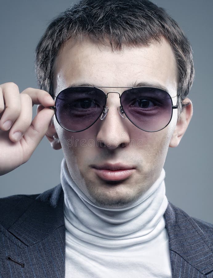 Young man in sunglasses. stock photo. Image of macho - 39960114
