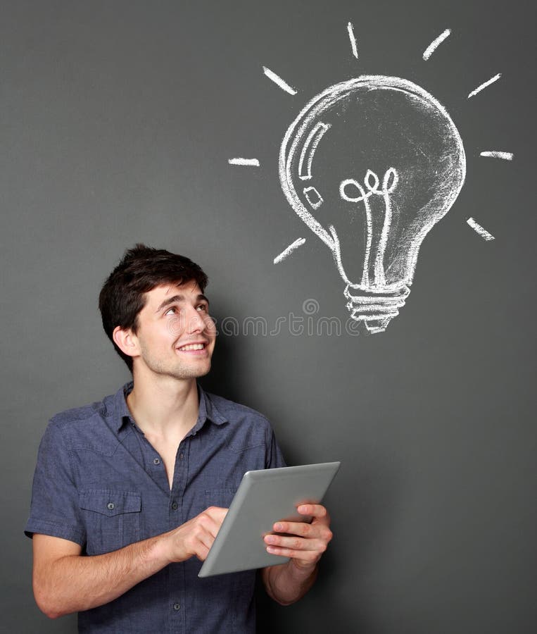 Young Man with Tablet Looking for Some Ideas Stock Photo - Image of ...