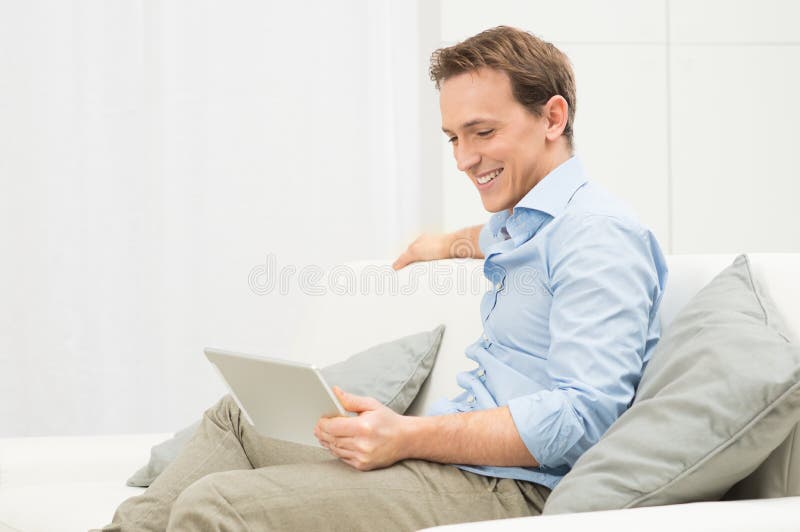 Young Man with Tablet stock image. Image of look, cheer - 38999551