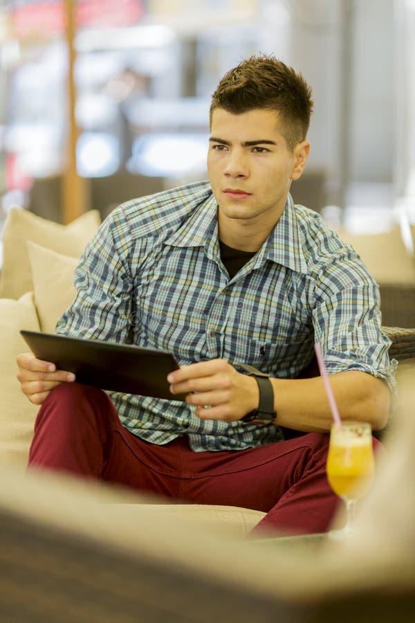 Young man with tablet stock image. Image of black, casual - 33760637