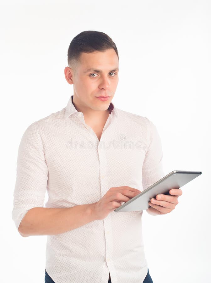 Young man with tablet stock photo. Image of internet - 62525772