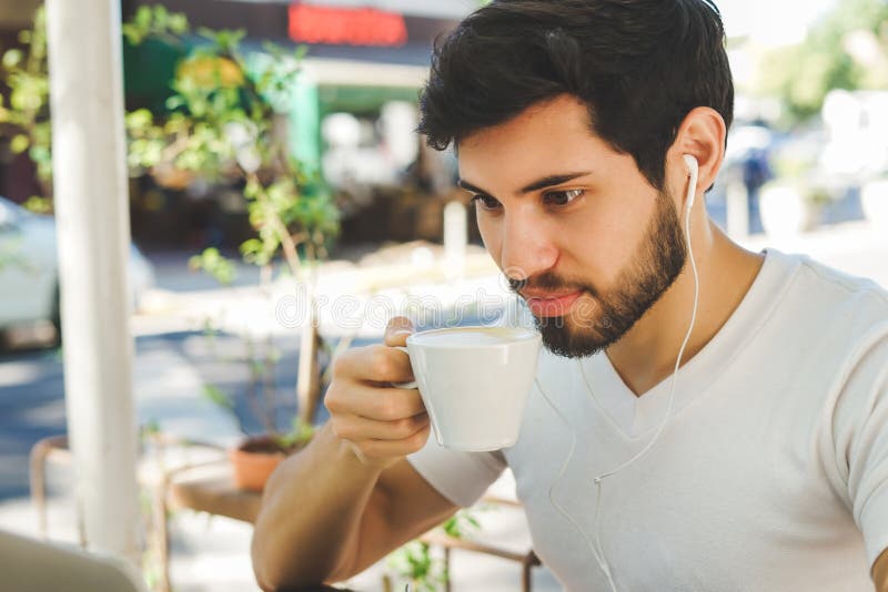 Young Man Taking a Coffee Break Stock Photo - Image of looking ... Young Man Taking a Coffee Break Stock Photo - Image of looking ...