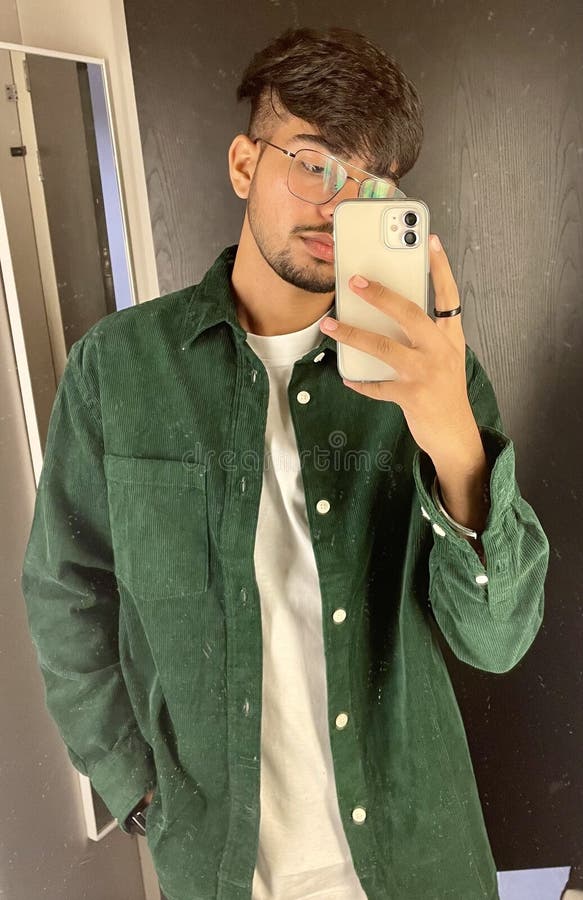 A Young Man Taking a Selfie in Front of a Mirror Stock Photo - Image of ...