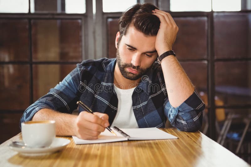 Young Man Taking Notes in His Notebook Stock Image - Image of industry ...