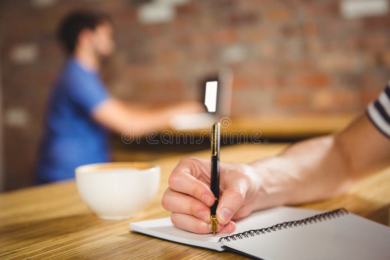 Young Man Taking Notes in His Notebook Stock Image - Image of young ...