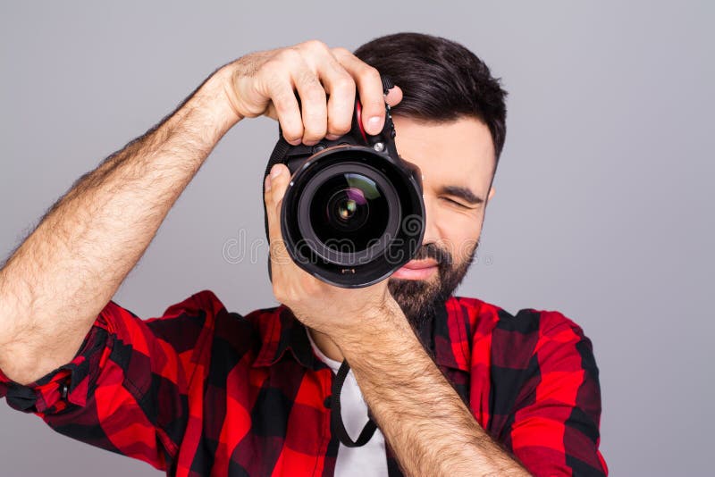 Young Man Taking Photo with Professional Digital Camera, Focus on Hand ...