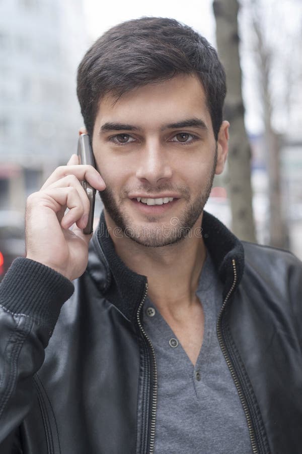 Young Man Talking with Cell Phone Stock Photo - Image of technology ...
