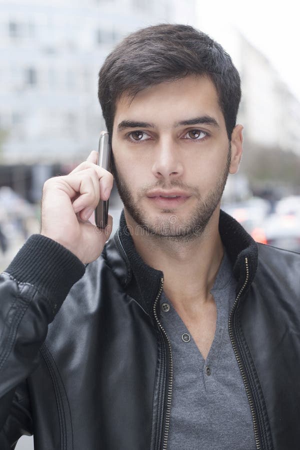 Young Man Talking with Cell Phone Stock Image - Image of adult ...