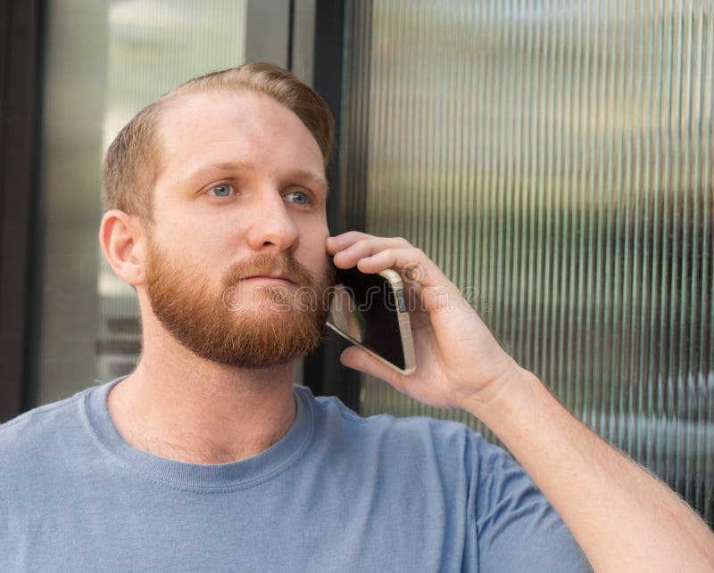 Man Smiling while Talking on Cell Phone Stock Image - Image of ...