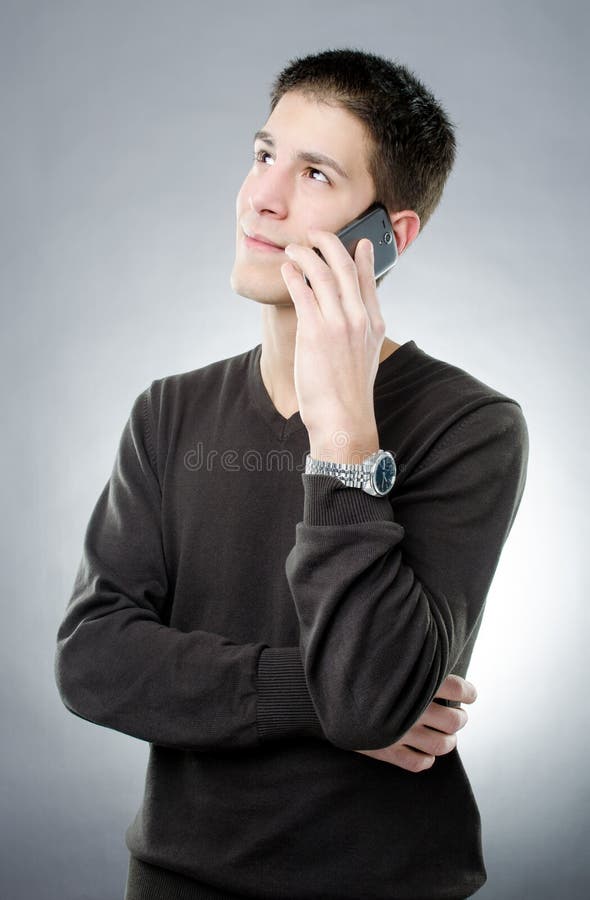 Young Man Talking on Mobile Phone Stock Image - Image of mobile, human ...