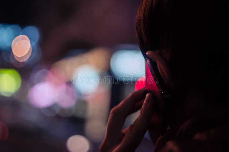 Young Man Talking on Mobile Phone at Night Stock Photo - Image of ...