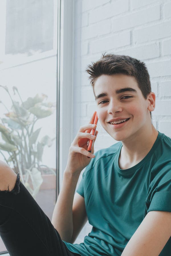 Young Man Talking on Mobile Stock Photo - Image of communications ...