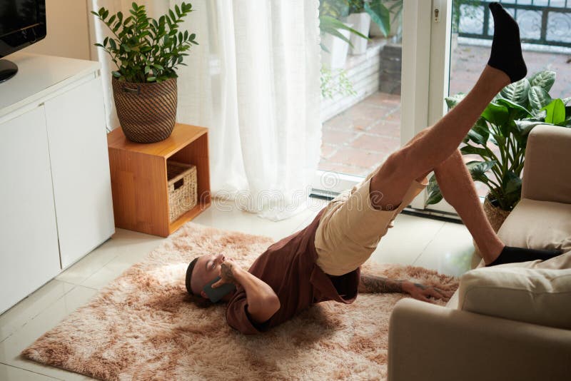 Man Doing Bridge Pose stock image. Image of apartment - 245606309