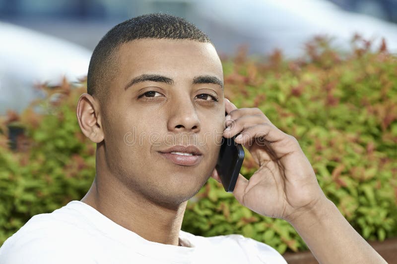 Young Man Talking on Smartphone Stock Image - Image of youth, telefon ...