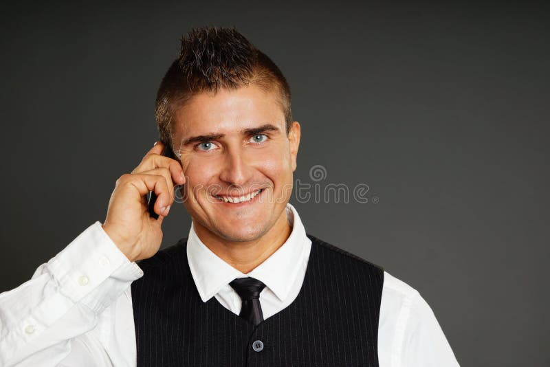 Man Talks into Mobile Phone Stock Photo - Image of emotion, cheerful ...