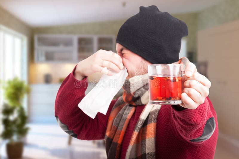 Young Man with Tea Mug Blowing Nose Stock Photo - Image of disease ...