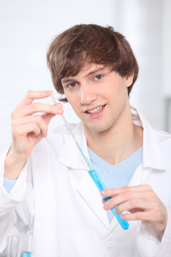 A Young Man with Testing Tube. Stock Image - Image of test, liquid ...