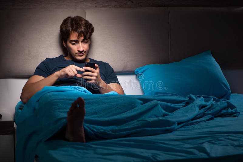 The Young Man Texting on Mobile Late at Night Stock Photo - Image of ...