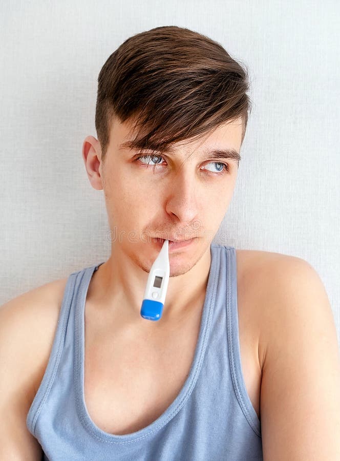 Young Man with a Thermometer Stock Image - Image of human, male: 320186225