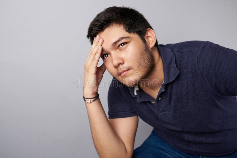 Young man think on problem stock image. Image of studio - 123783205
