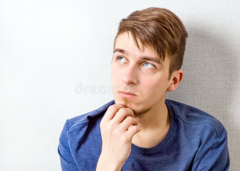Young Man is Thinking stock photo. Image of anxiety - 237609198