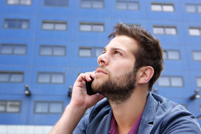 Young Man Thinking with Mobile Phone Stock Image - Image of cute, model ...