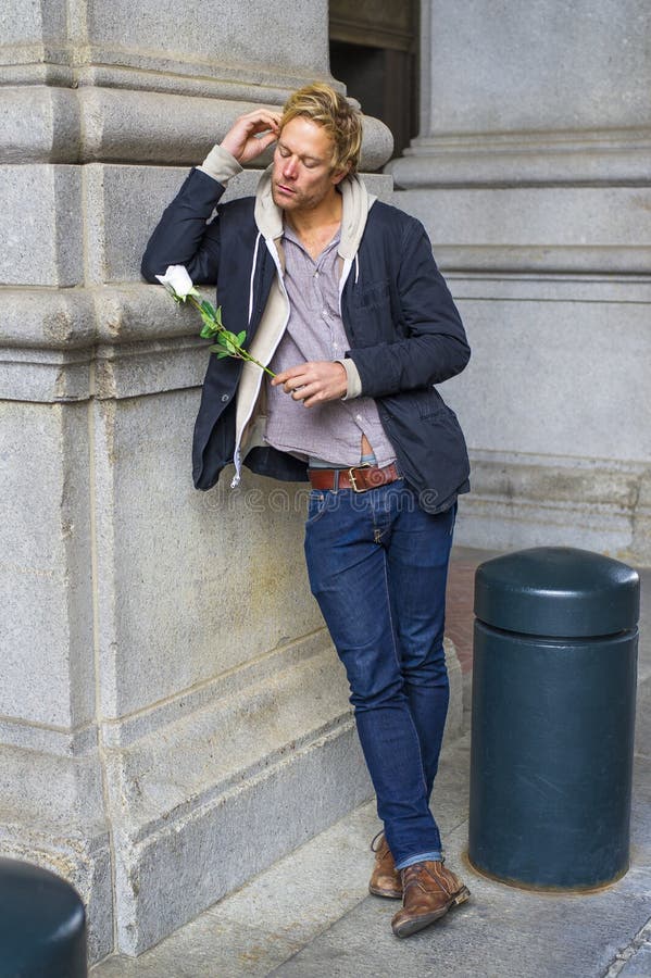 Young Man Thinking Outside stock photo. Image of gift - 221145222