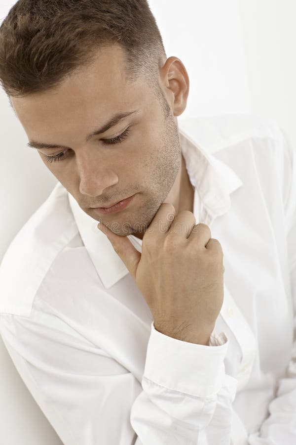 Young man thinking stock image. Image of dreamy, face - 32051693