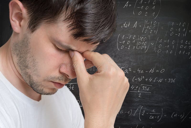 Young Man in Thinking. Solving a Difficult Math Problem Stock Image ...