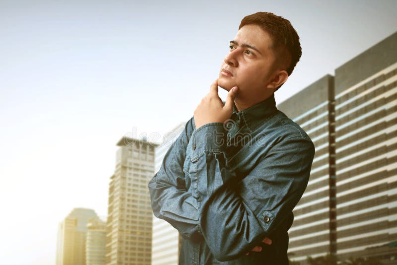 Young man thinking stock photo. Image of concept, idea - 82743978