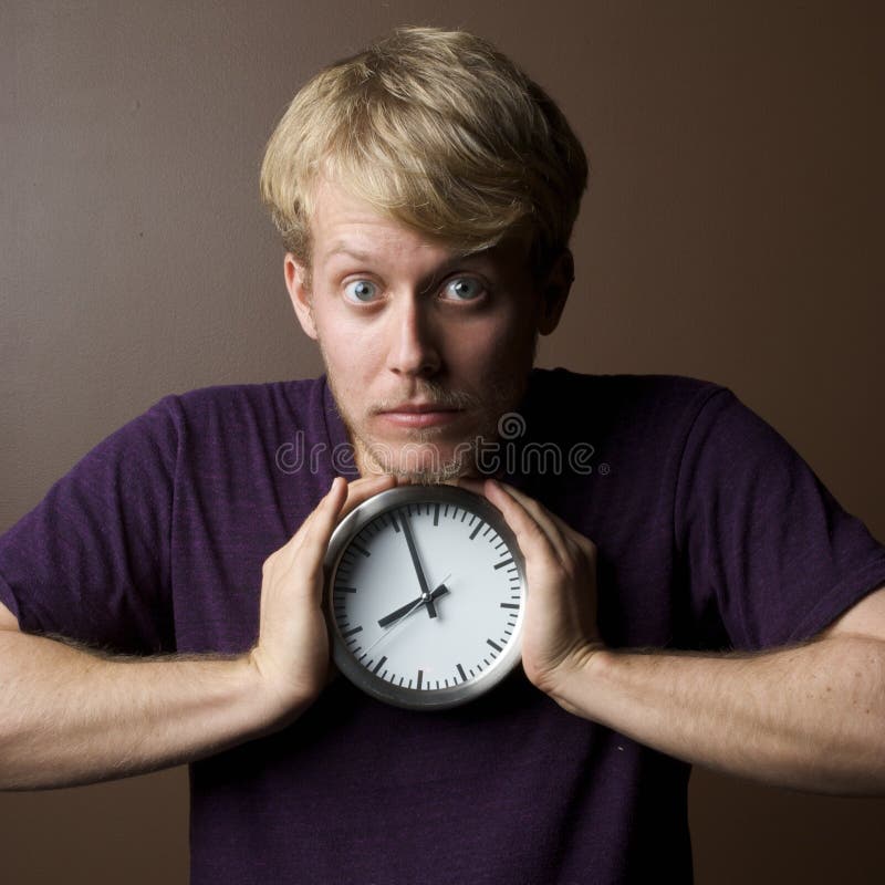 Young Man Thinking about Time Stock Photo - Image of young, curious ...