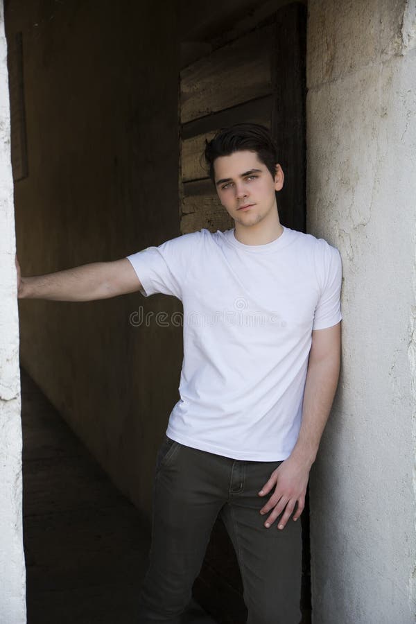 Young Man on Threshold, with Confident Look Stock Photo - Image of ...