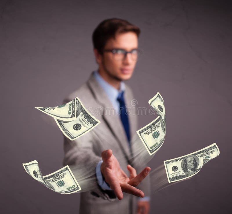 Young man throwing money stock photo. Image of holding - 51309764