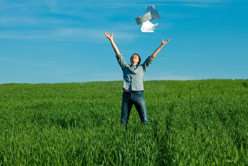 Young man throwing a paper stock image. Image of business - 16737763