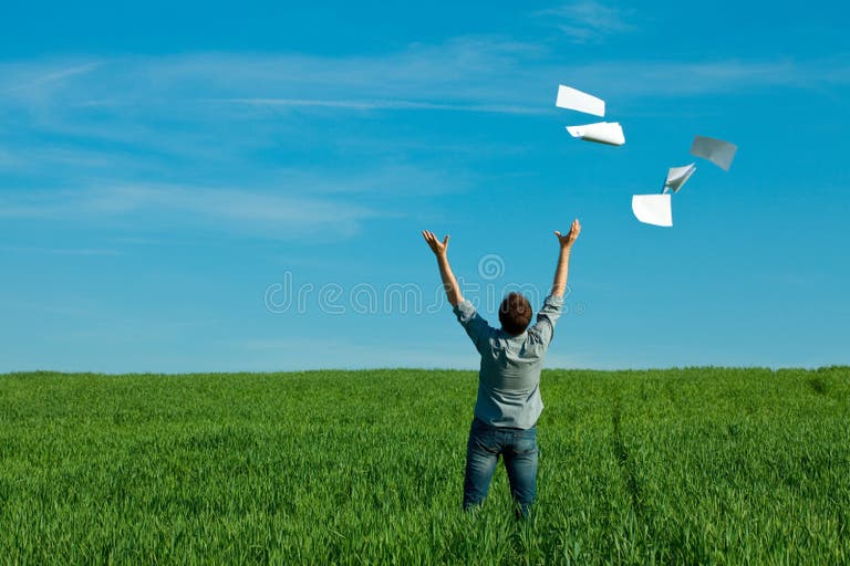 Young man throwing a paper stock image. Image of business - 16737763