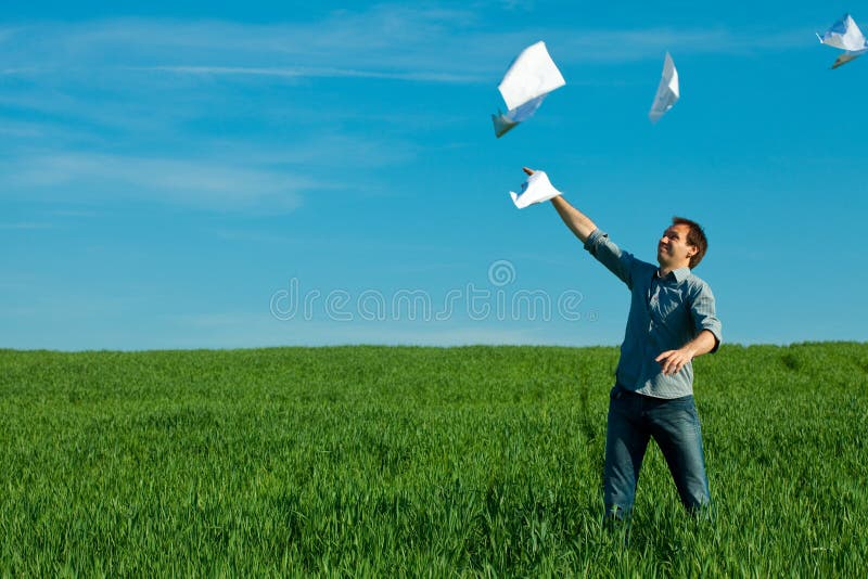 Young man throwing a paper stock photo. Image of satisfaction - 16737776